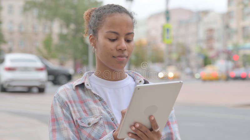 African Woman Using Digital Tablet Outdoor Stock Image - Image of ...