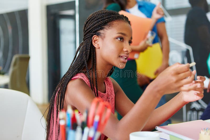 African woman in workshop stock image. Image of corporate - 89974125