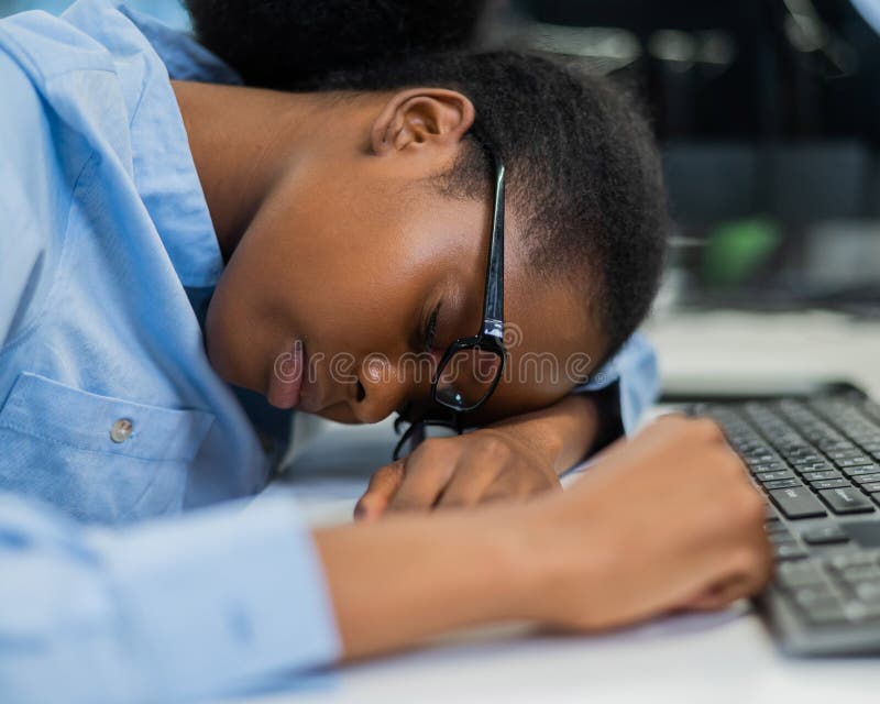 African Young Woman Sleeping at Work Desk. Stock Photo - Image of girl ...