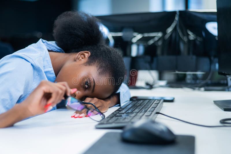 African Young Woman Sleeping at Work Desk. Stock Photo - Image of ...