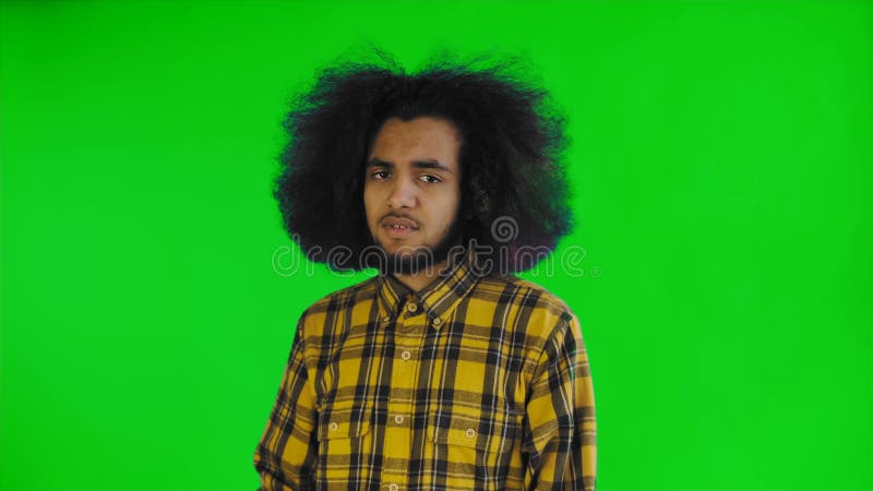 Afro-American Man Gesturing Thumbs Down on Green Screen or Chroma Key ...