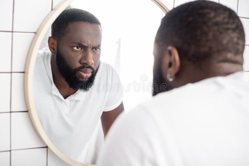 Afro-american Man Looking at Reflection Stock Image - Image of hygiene ...