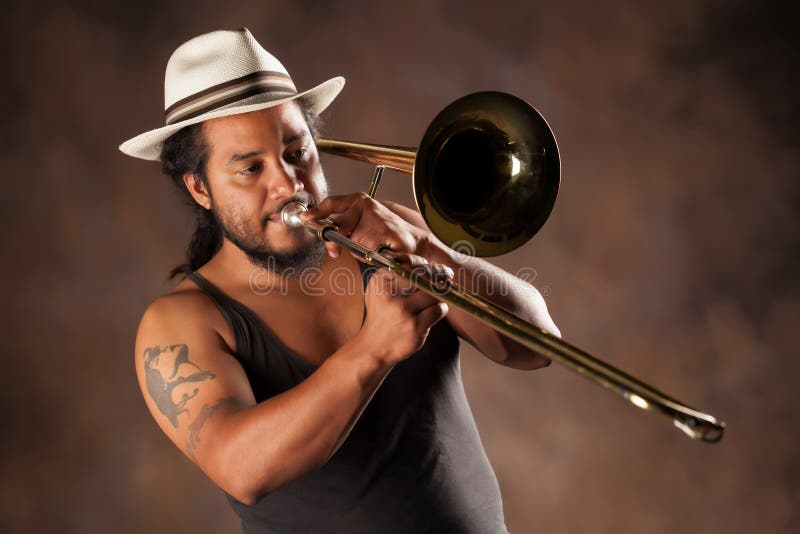 Afro Man Playing Trombone stock photo. Image of orchestra - 61154484