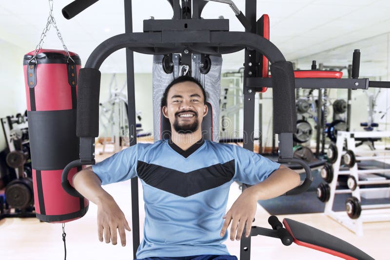 Afro Man Sitting Weight Machine Stock Photos - Free & Royalty-Free ...