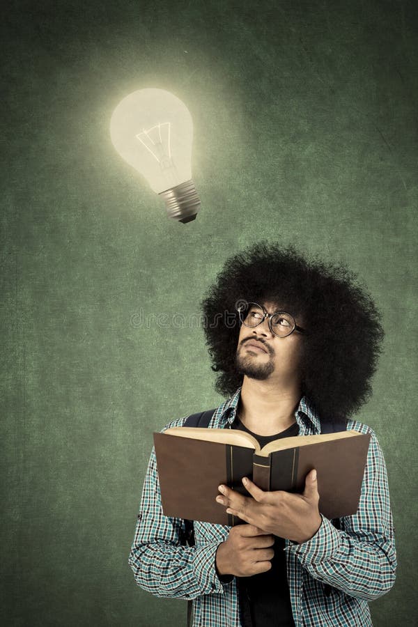 Afro Man Thinking Idea with Light Bulb Stock Image - Image of casual ...
