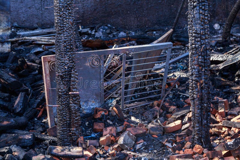 The Aftermath of a Fire in Old Wooden Sheds Stock Image - Image of ...