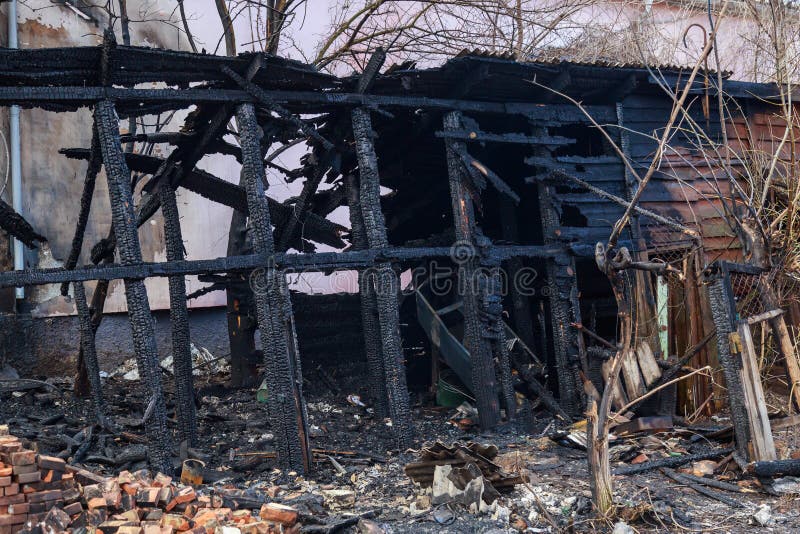 The Aftermath of a Fire in Old Wooden Sheds Stock Photo - Image of ...