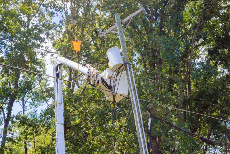 In Aftermath of Severe Hurricane, Emergency Workers are Repairing a ...