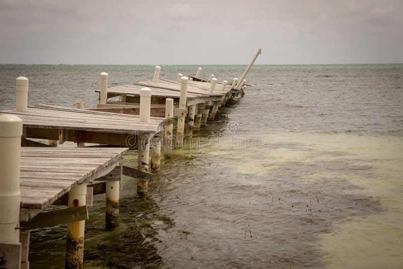 Aftermath of a Storm on a Pier Stock Image - Image of country, water ...