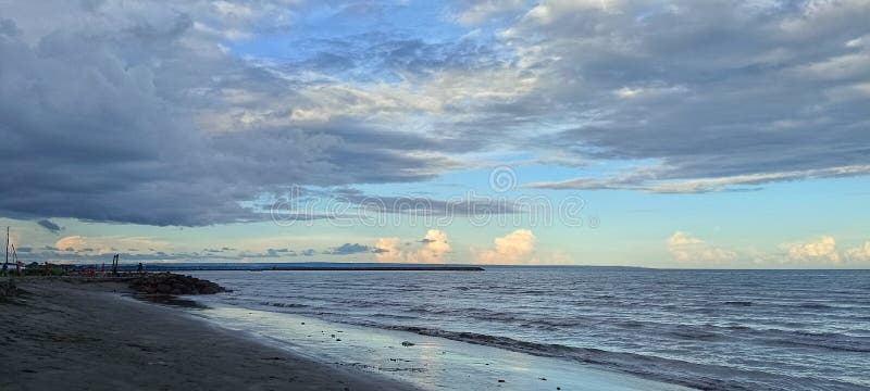 Afternoon on the Beach Watching the Sunset and the Waves Stock Image ...