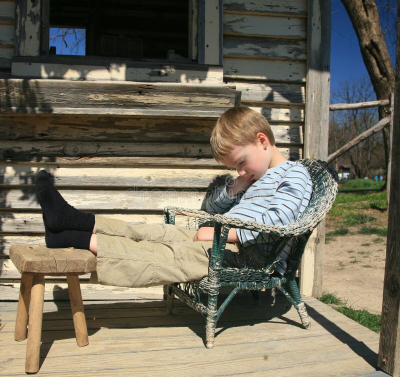 Boy Taking Afternoon Nap stock image. Image of outside - 4571795