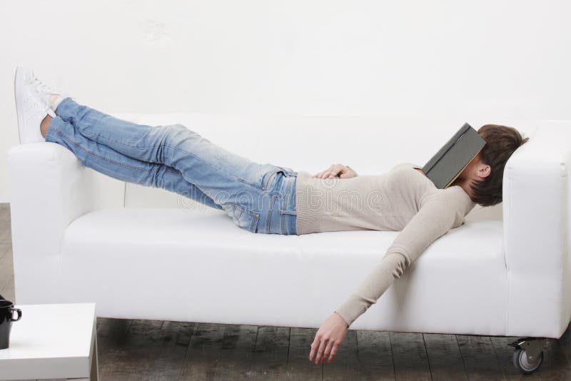 Afternoon Nap with Book on Face Stock Photo - Image of pretty, female ...