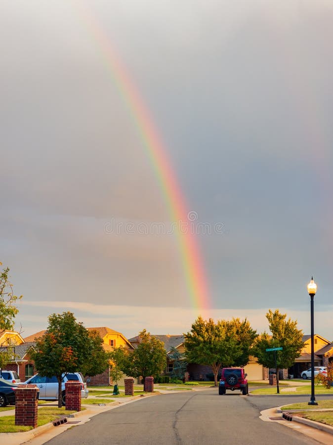 Afternoon View of a Big Rainbow Over Community Stock Photo - Image of ...
