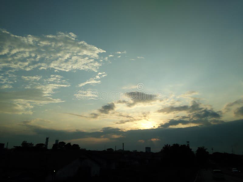 In the Afternoon Waiting for the Sun To Set and before Night Comes ...