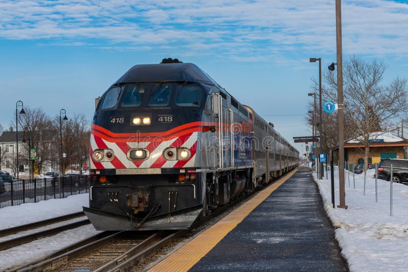 Metra Locomotive 209 Pushing a Passenger Train Toward Chicago Editorial ...