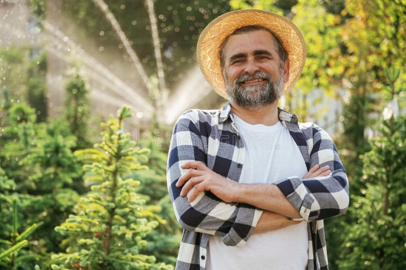 Against Automatic Watering Machine Senior Gardener Work Daytime Stock ...