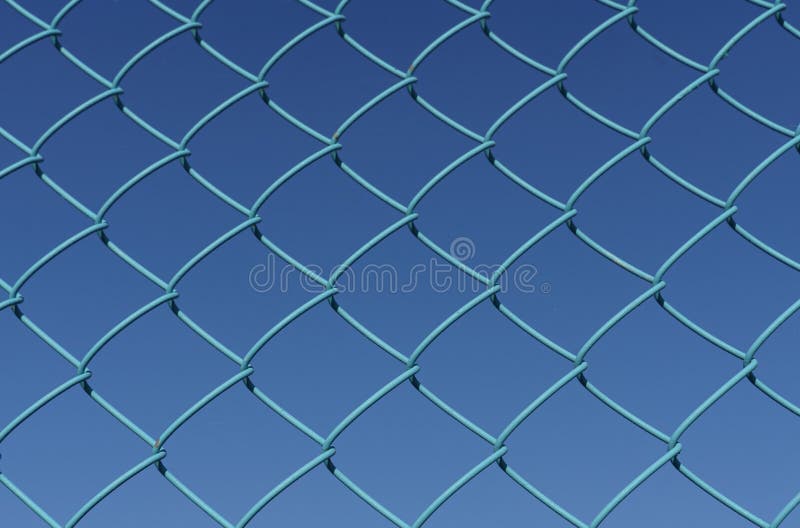Against the Background of a Blue Sky, a Mesh Metal Mesh of Blue Color ...