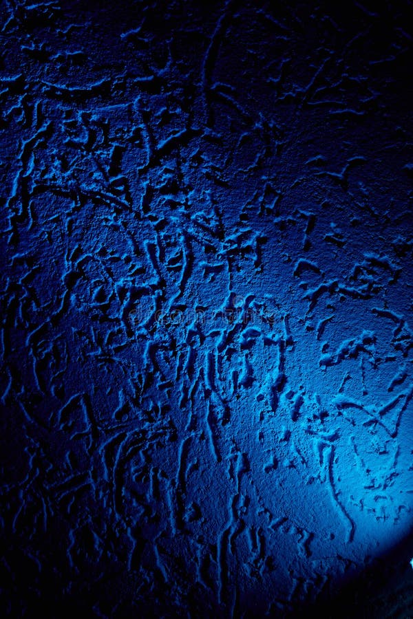 Against a Background with an Unusual Pattern of Diffused Light of Blue ...