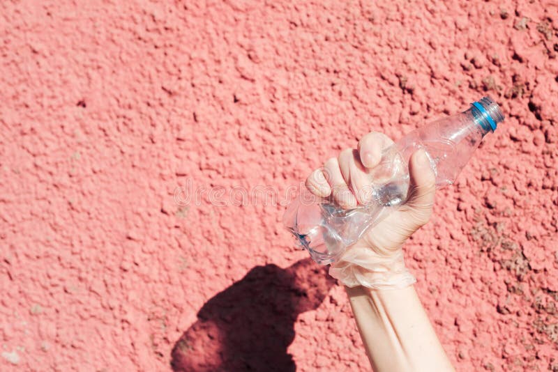 We are Against Plastic Garbage. a Hand in Protective Gloves Clutches an ...