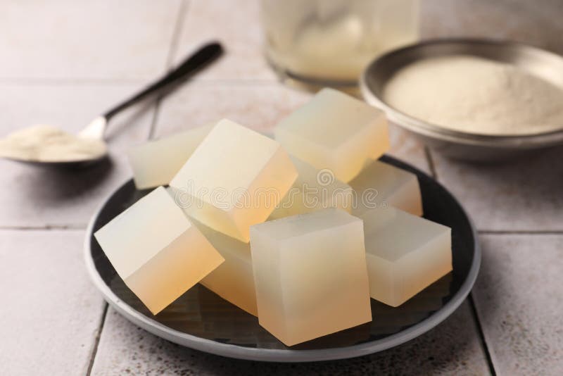 Agar-agar Jelly Cubes on Tiled Surface, Closeup Stock Image - Image of ...
