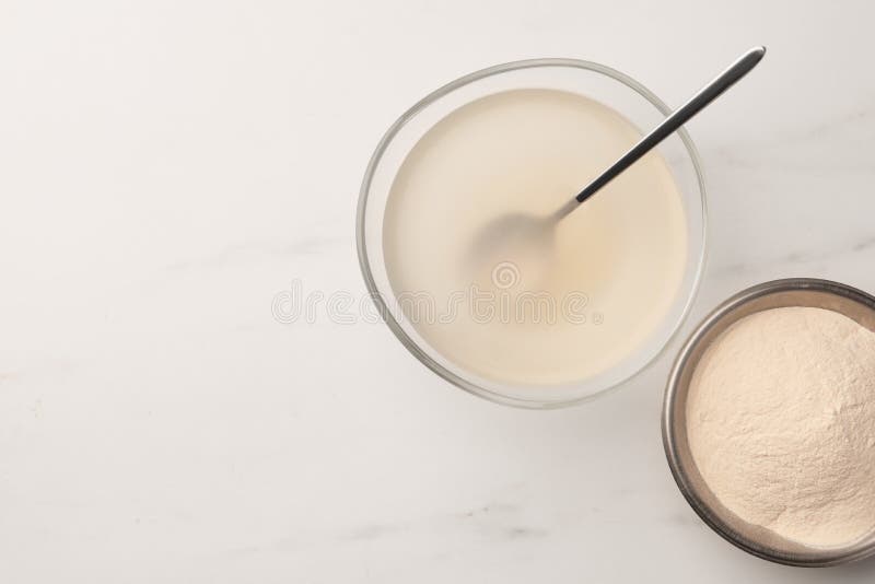 Agar-agar Jelly and Powder on White Marble Table, Flat Lay. Space for ...