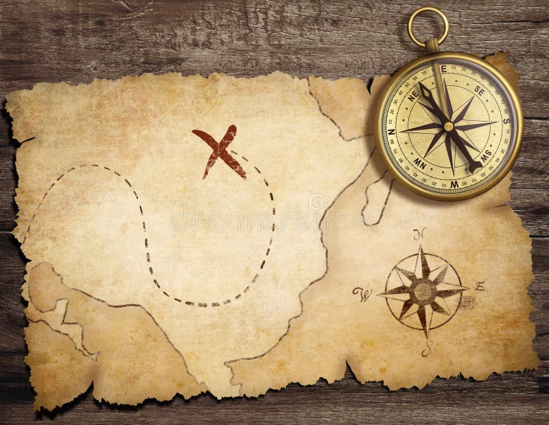 Aged Brass Antique Nautical Compass on Table Stock Photo - Image of ...