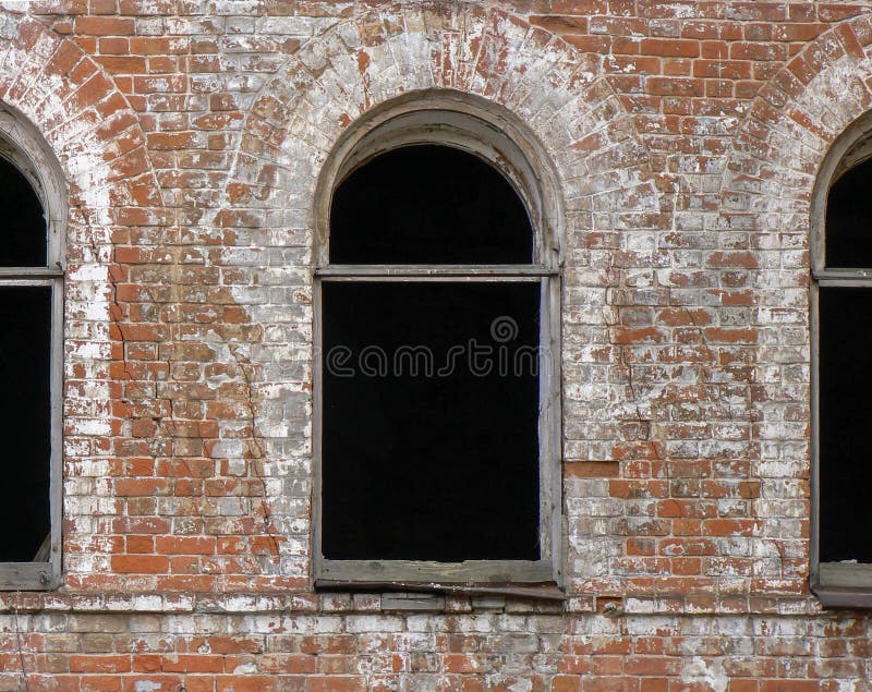 Aged Brick Wall with Arched Bricked Up Windows Stock Photo - Image of ...