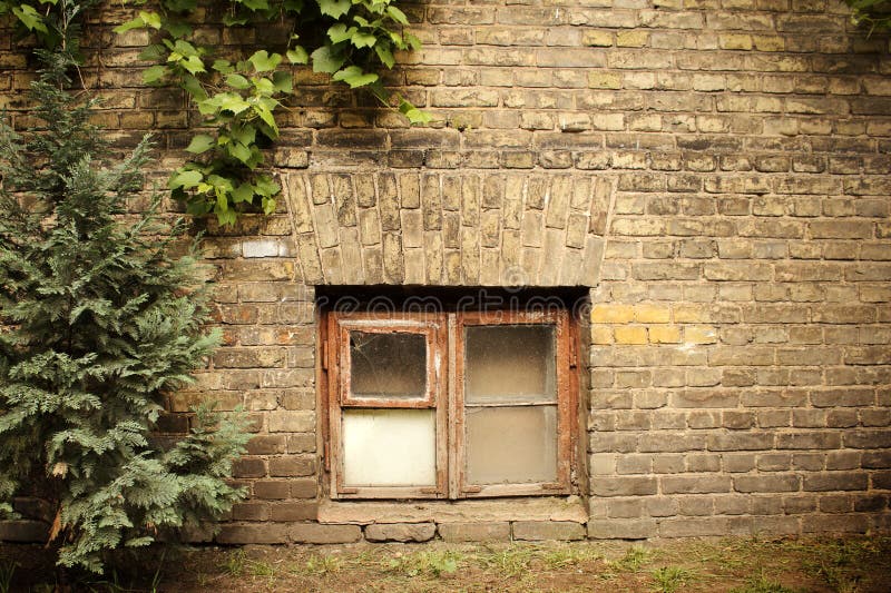 Aged Brick Wall with Small Rectangular Basement Window Stock Image ...
