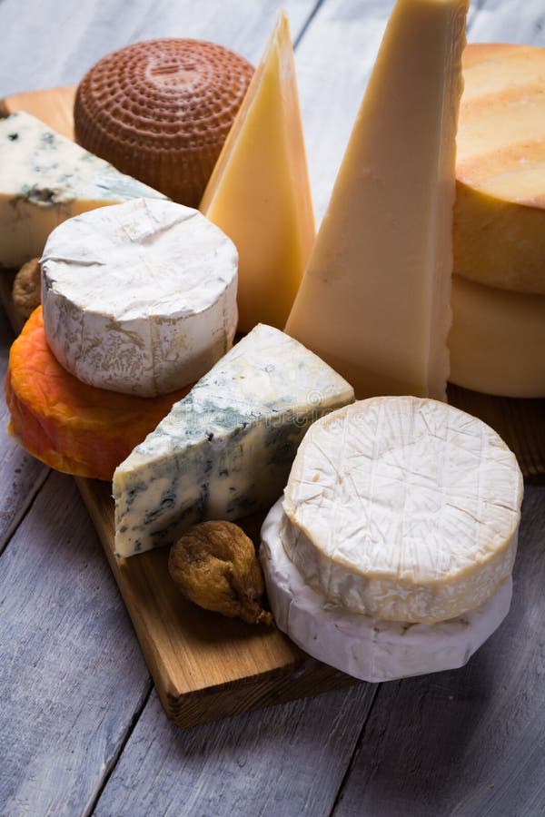 Aged Cheese Round and Slices Stock Image - Image of ripe, board: 146662113