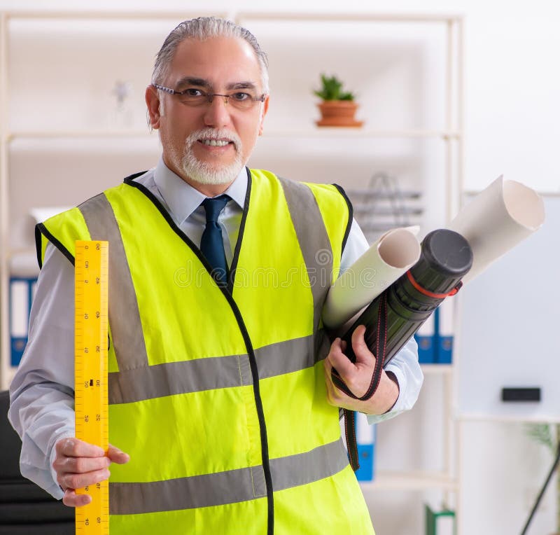 Aged Construction Engineer Working in the Office Stock Image - Image of ...