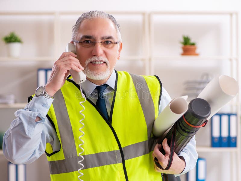 Aged Construction Engineer Working in the Office Stock Photo - Image of ...