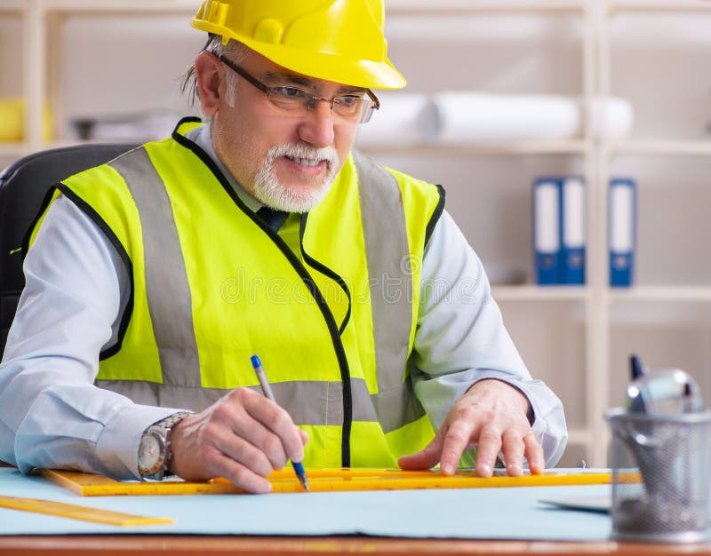 Aged Construction Engineer Working in the Office Stock Image - Image of ...