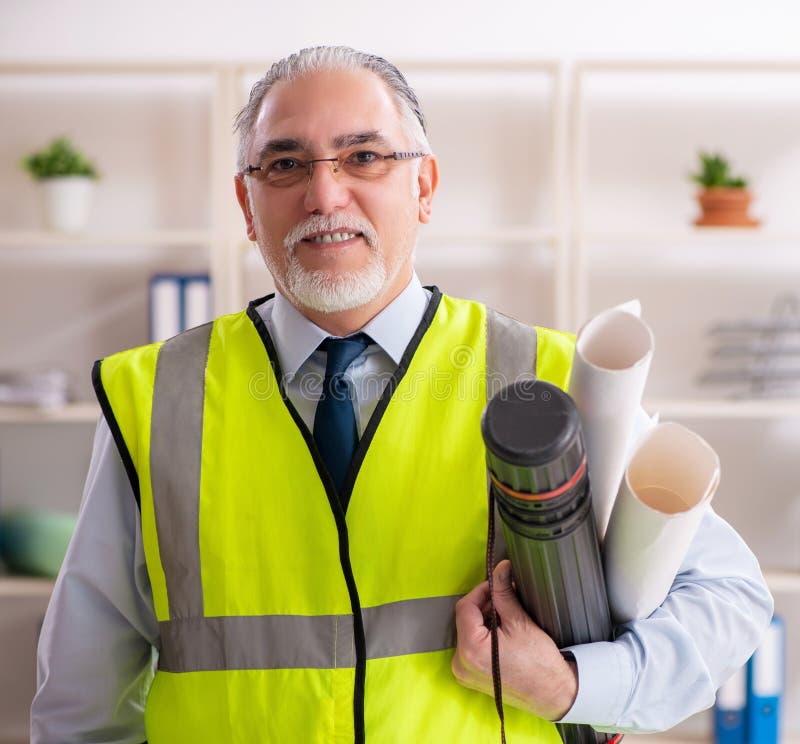 Aged Construction Engineer Working in the Office Stock Image - Image of ...