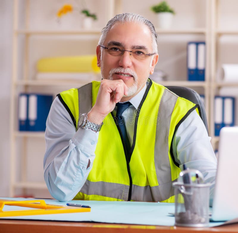 Aged Construction Engineer Working in the Office Stock Photo - Image of ...