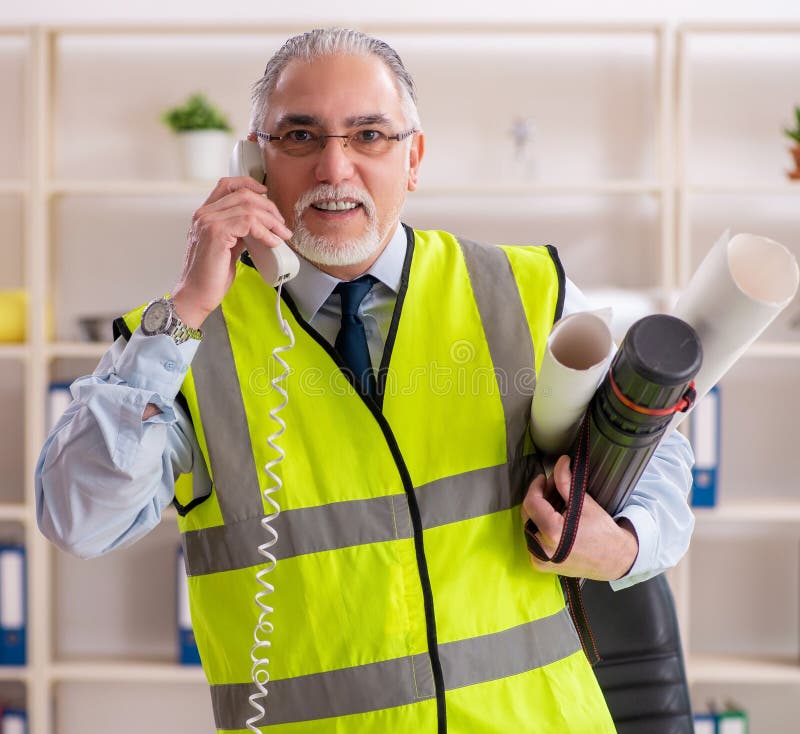 Aged Construction Engineer Working in the Office Stock Image - Image of ...