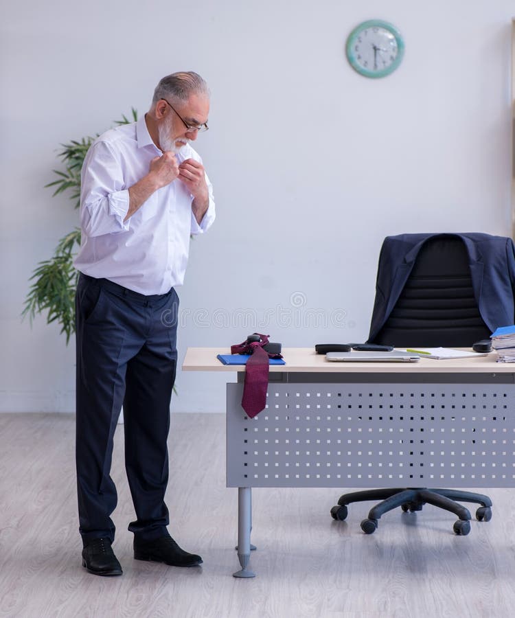 Aged Male Employee Doing Physical Exercises during Break Stock Photo ...