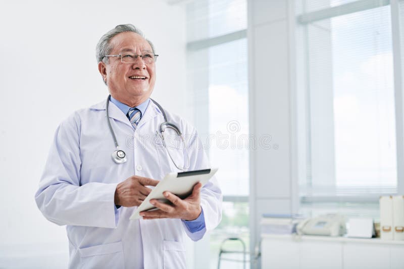 Aged general practitioner stock photo. Image of gadget - 74534372
