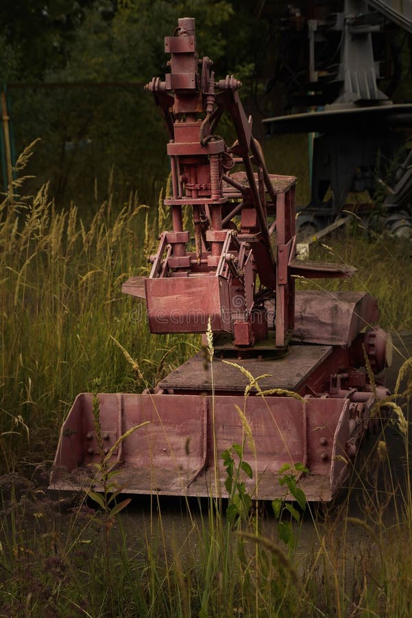 Aged Machine Cleaning the Contaminated Area after the Catastrophe in ...