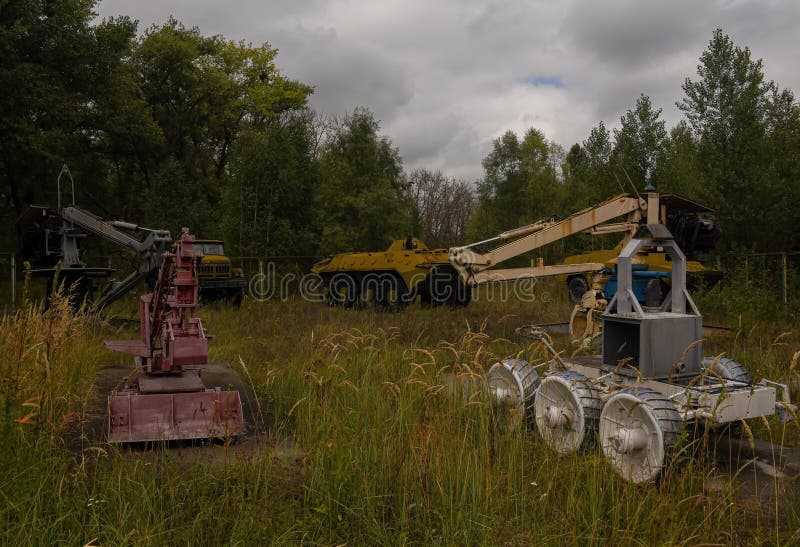 Aged Machine Cleaning the Contaminated Area after the Catastrophe in ...