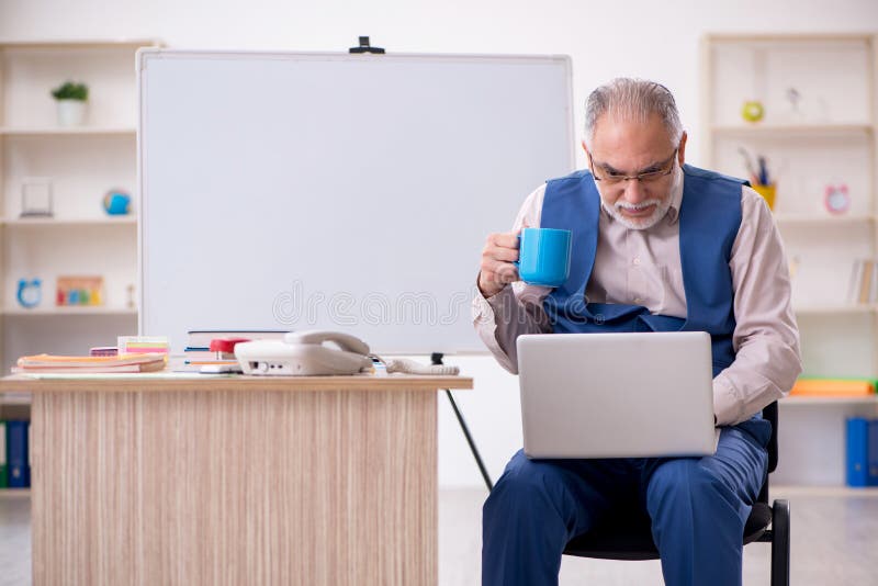 Old Male Designer Working in the Office Stock Photo - Image of ...