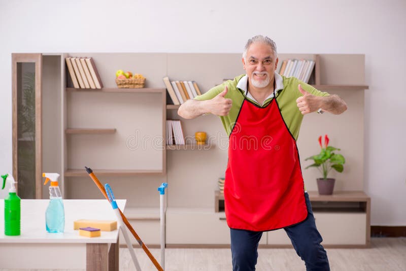Old man cleaning the house stock photo. Image of janitor - 228091822