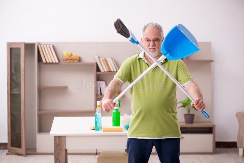 Old man cleaning the house stock photo. Image of maid - 230147744