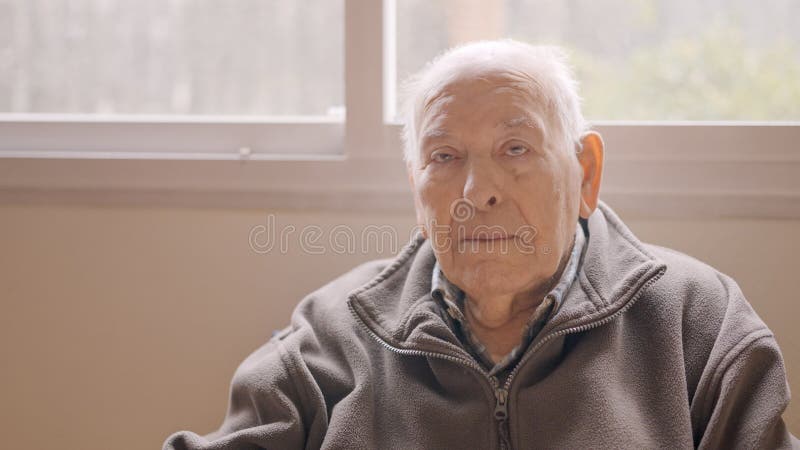 Aged Man Looking Serious Sitting on a Geriatric Stock Image - Image of ...