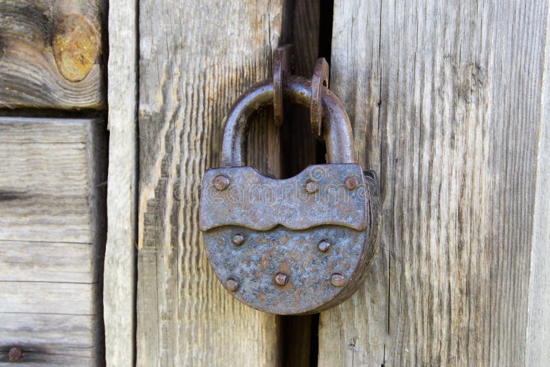 Aged Padlock on Wooden Doors Stock Photo - Image of protection, steel ...