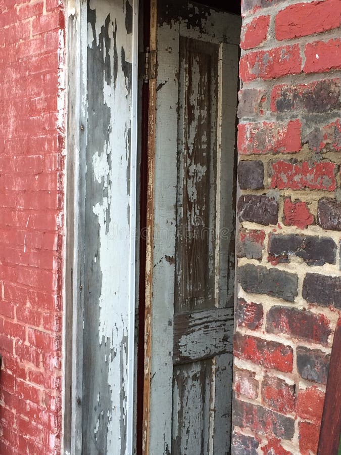 Aged red brick store front stock image. Image of front - 76308699