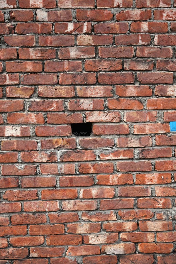 Aged Red Brick Wall with Single Missing Brick Stock Image - Image of ...