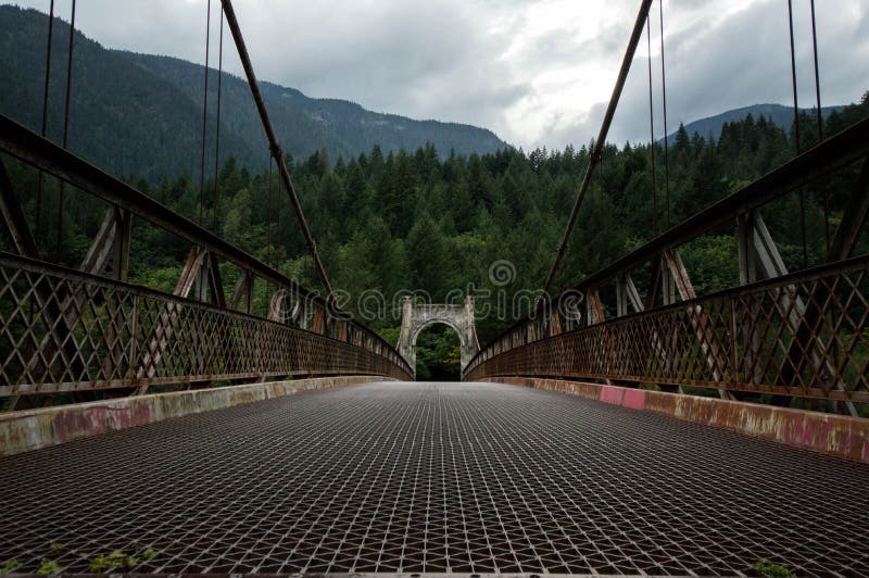Rustic Bridge in the Mountains Stock Photo - Image of overbid, metal ...