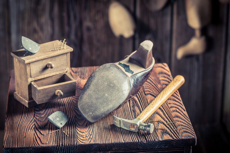 Vintage Shoemaker Workshop with Leather and Tools Stock Image - Image ...