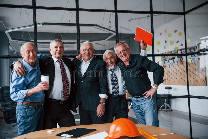 Aged Team of Elderly Businessman Architects Stands in the Office ...