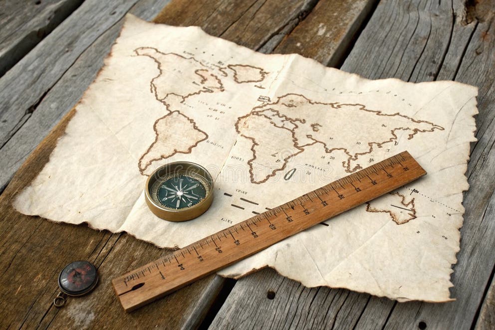 Aged Treasure Map, Ruler, and Old Bronze Compass on Table Stock ...